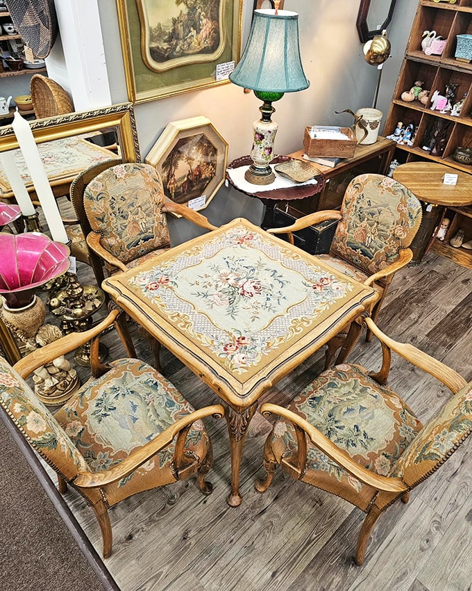 This elegant needlepoint dining set isn't just furniture&mdash;it's a portal to fancy dinner parties of the past. Tea, anyone?