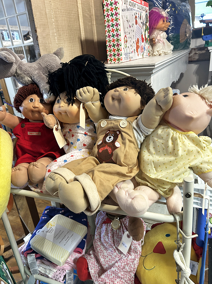 Vintage dolls gather like they're plotting their next tea party, bringing nostalgic charm to the toy section. 