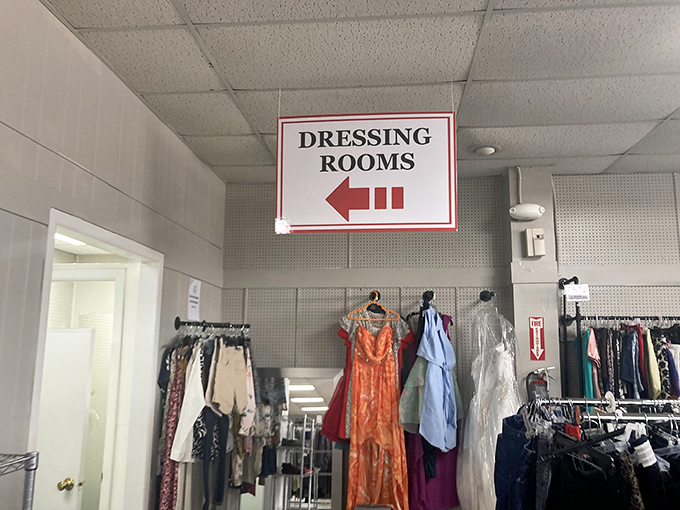 The dressing room sign points the way to fashion revelation. Where "Does this still fit?" meets "I can't believe this costs so little!"