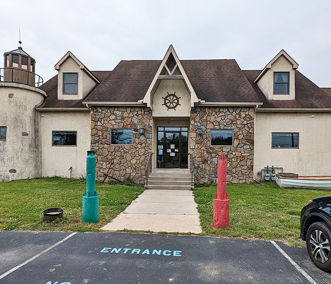The entrance beckons with maritime charm&mdash;note the ship's wheel emblem above the door, a promise of nautical delights within.