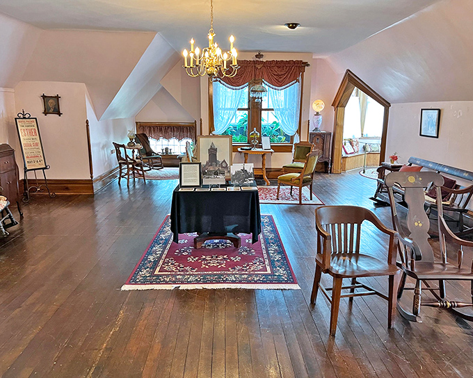The attic exhibition space proves that even Victorians' storage solutions were more elegant than our living rooms. That chandelier has illuminated more history than most textbooks.