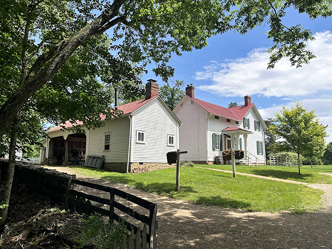 The farmhouse stands as a testament to practical beauty&mdash;no open concept needed when your concept is simply "home."