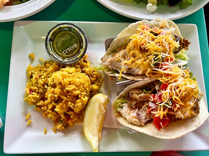 Fish tacos that make Tuesdays worth celebrating any day of the week. Served with yellow rice that's anything but an afterthought.