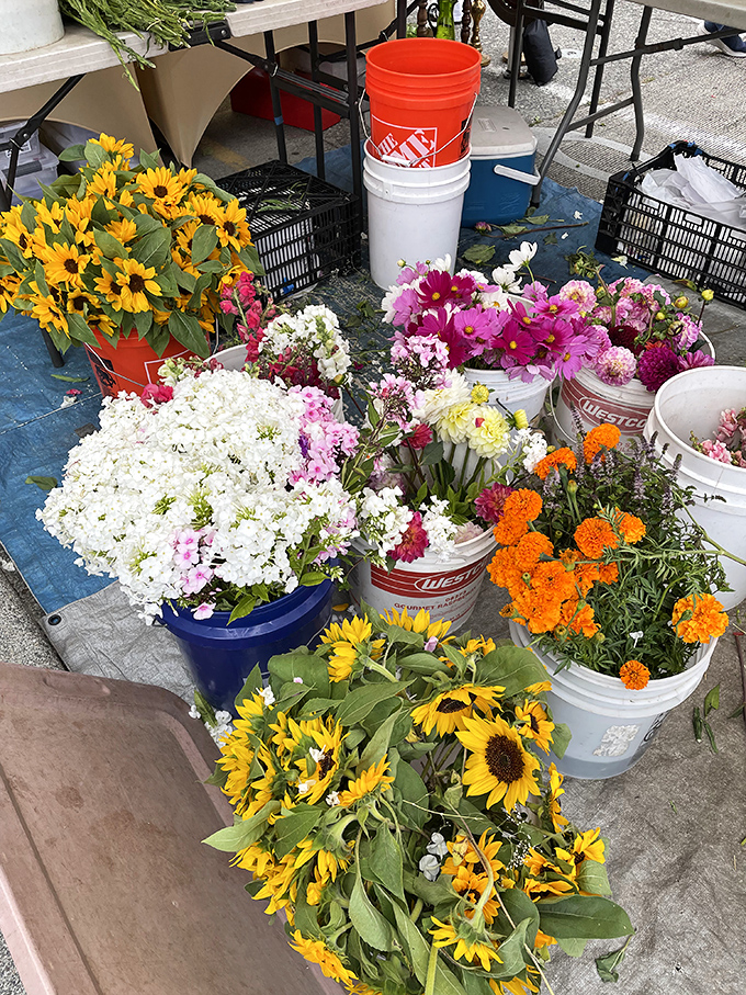 Buckets of fresh-cut flowers bring bursts of color to the market. Take home a sunflower bouquet that somehow manages to outshine even a rare Seattle sunny day.