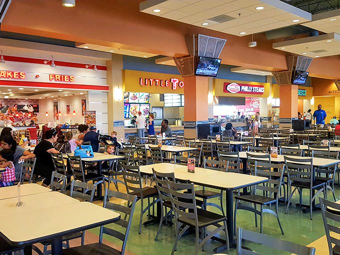 The food court: civilization's greatest contribution to shopping stamina. Where hungry shoppers refuel before the second wave of retail conquest.