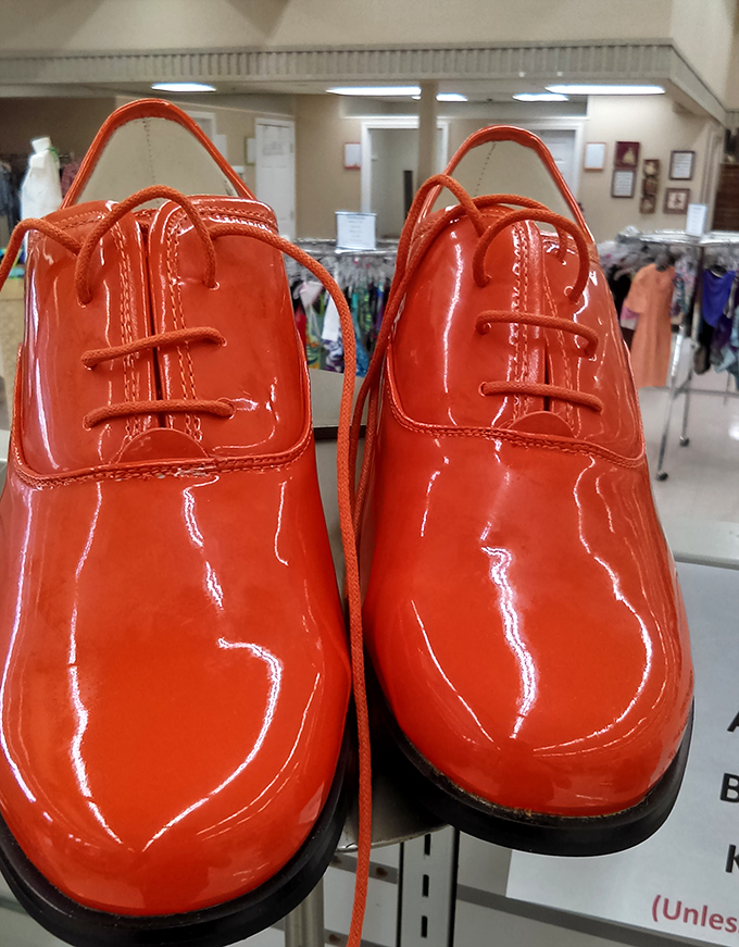 These glossy orange shoes aren't just footwear&mdash;they're a statement waiting to happen. Someone's future conversation starter sits patiently on the shelf.