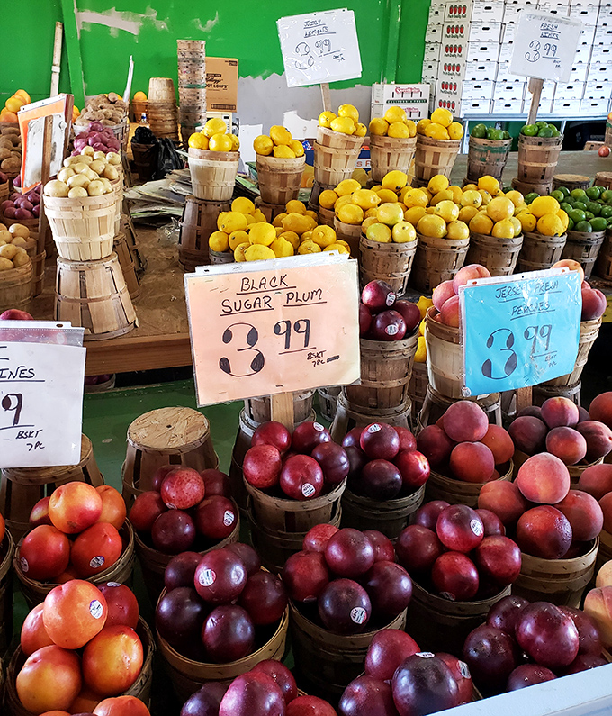 Nature's candy store! These plump fruits nestled in rustic baskets make supermarket produce look like sad distant cousins who weren't invited to the family reunion.