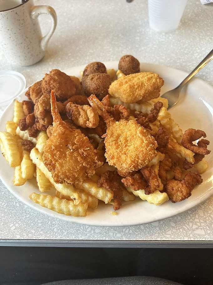 A seafood platter that brings the ocean to your table&mdash;crispy fried shrimp and hushpuppies that would make Neptune himself request seconds.