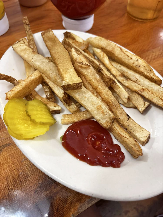 These aren't just fries &ndash; they're potato perfection sticks with the ideal crisp-to-fluffy ratio that makes ketchup optional but highly recommended.