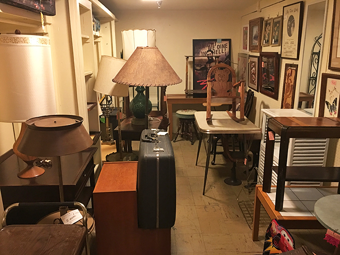 Lamps, luggage, and lovingly worn furniture create the perfect vignette &ndash; like walking onto a film set for "The Way We Lived Then." 