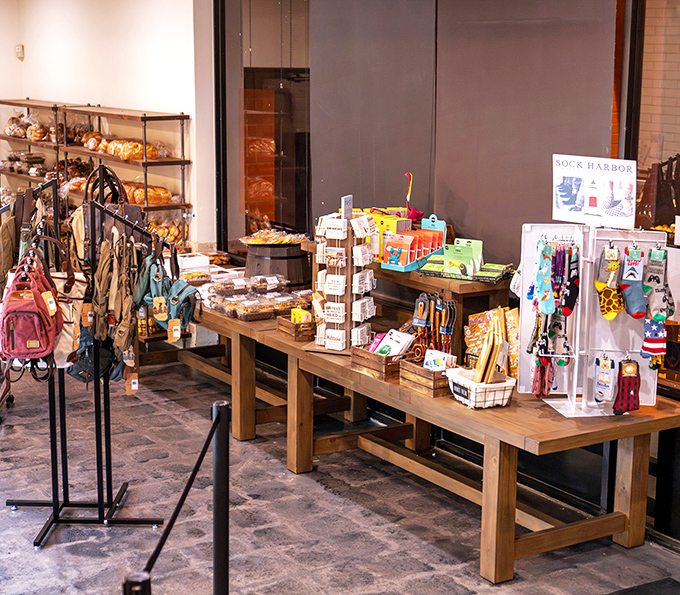The gift shop offers edible souvenirs and quirky merchandise, because nothing says "I thought of you" like bagel-themed socks from Arizona.
