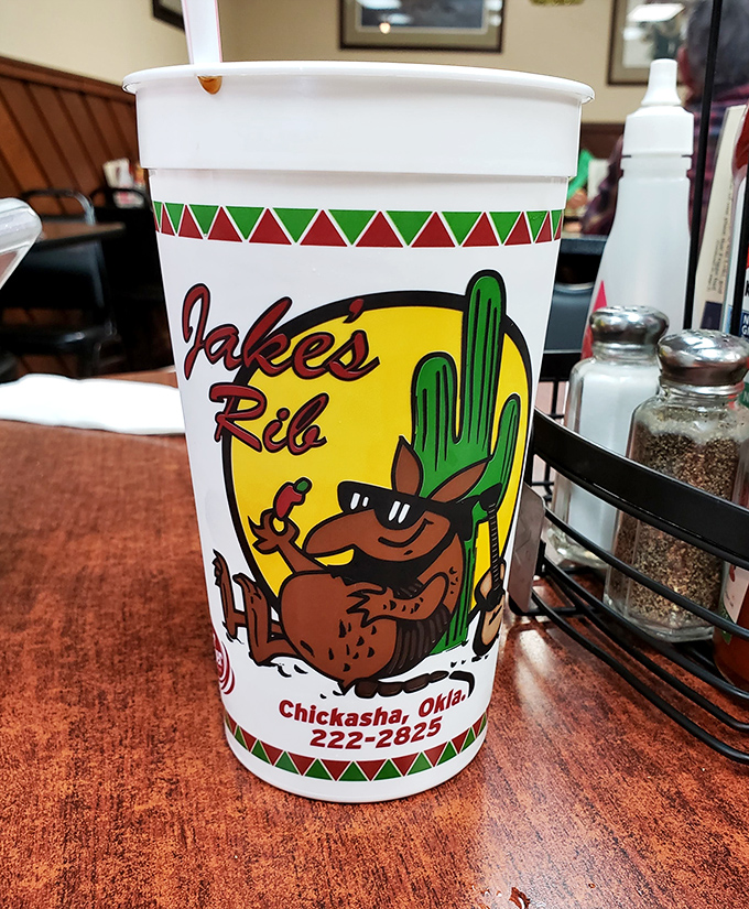 Their signature cup featuring a sassy armadillo mascot&mdash;because great barbecue deserves memorable branding and ice-cold drinks.