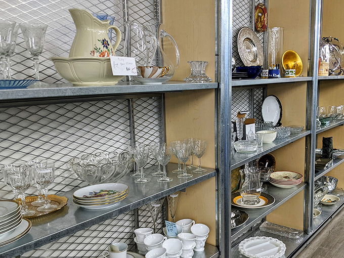 Crystal and ceramic treasures await new dinner parties. These shelves of glassware tell stories of celebrations past while promising future toasts at fraction-of-retail prices.