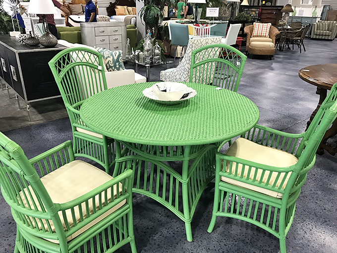 A bright green wicker dining set that's bold enough to make your neighbors wonder why their patio furniture is so boring.