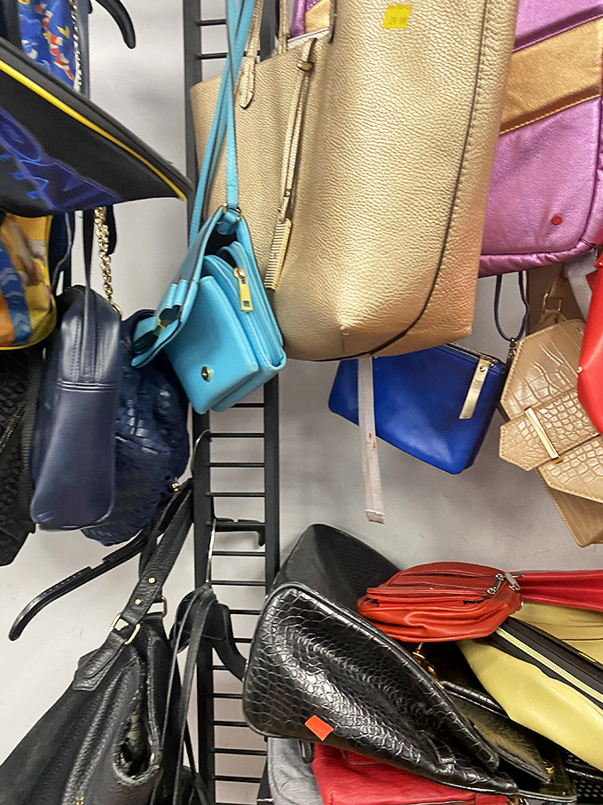 Handbag heaven! Designer dreams at earthly prices – each one previously carried through Manhattan's concrete canyons, now awaiting new adventures.