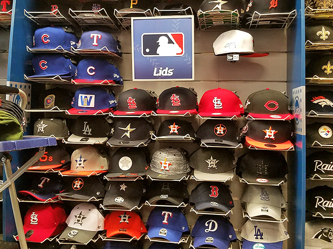 Baseball cap collections covering every team allegiance, because loyalty comes in fitted sizes too.