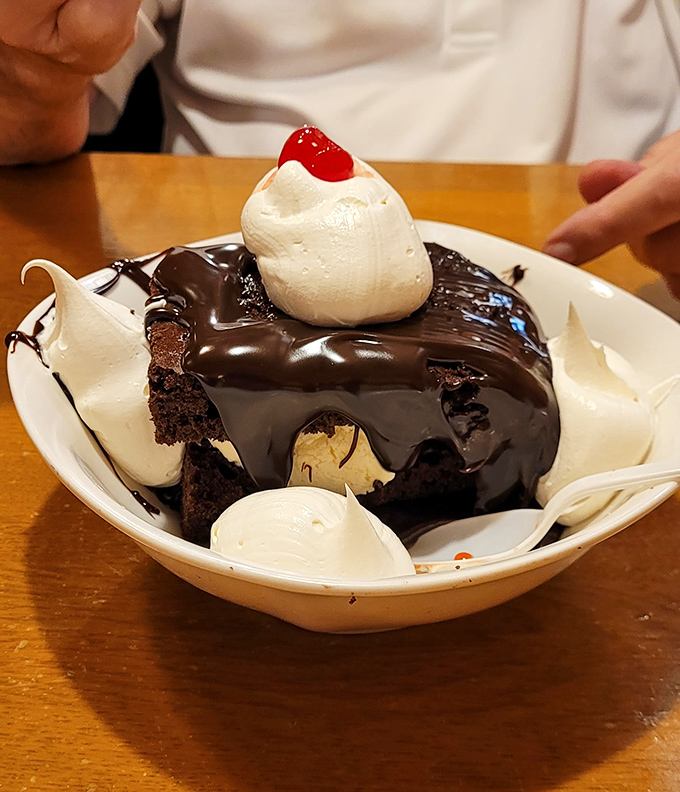 This isn't just dessert&mdash;it's a chocolate monument with whipped cream pillars. Worth every calorie and the extra mile on tomorrow's walk.