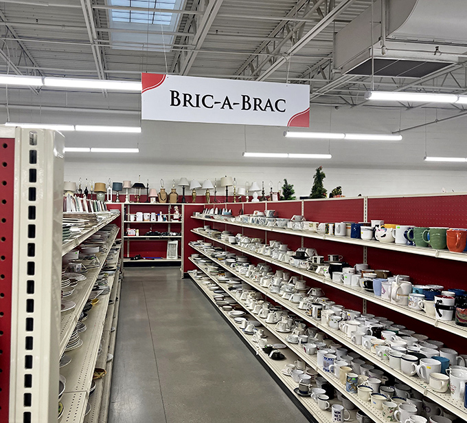 Bric-a-brac boulevard, where yesterday's kitchen treasures await adoption. One shopper's forgotten mug is another's morning coffee salvation.