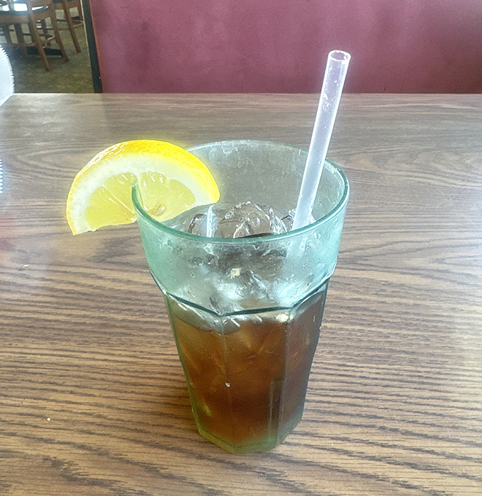 Iced tea served up proper with lemon, because some classics don't need reinventing by mixologists with handlebar mustaches.