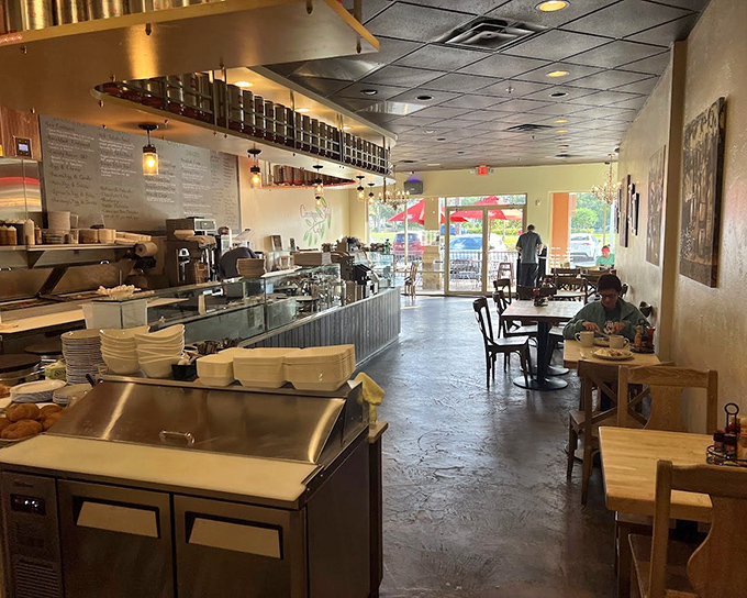 Morning light streams through windows, illuminating a space where coffee flows and breakfast dreams become delicious reality.