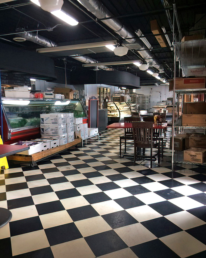 The market section reveals Litton's secret identity as a triple-threat: restaurant, bakery, and grocery with that classic checkered floor.