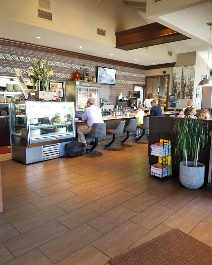 The counter seating offers front-row tickets to the culinary show, where coffee refills flow as freely as diner gossip.