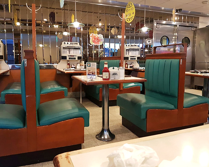 The turquoise booths and retro dividers aren't just seating&mdash;they're time machines to when conversation and comfort food were life's greatest luxuries.