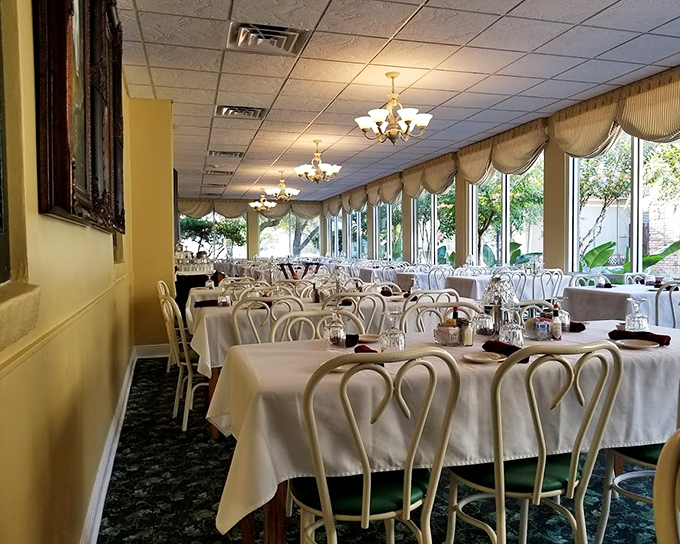 Sunlight streams through windows in this dining room where countless "I remember whens" have been exchanged over bread pudding.