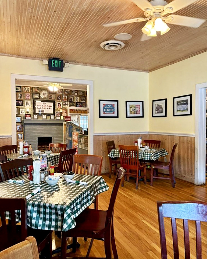 Every inch of wall space tells a story, while wooden ceilings and checkered tablecloths create the perfect backdrop for making memories over comfort food.