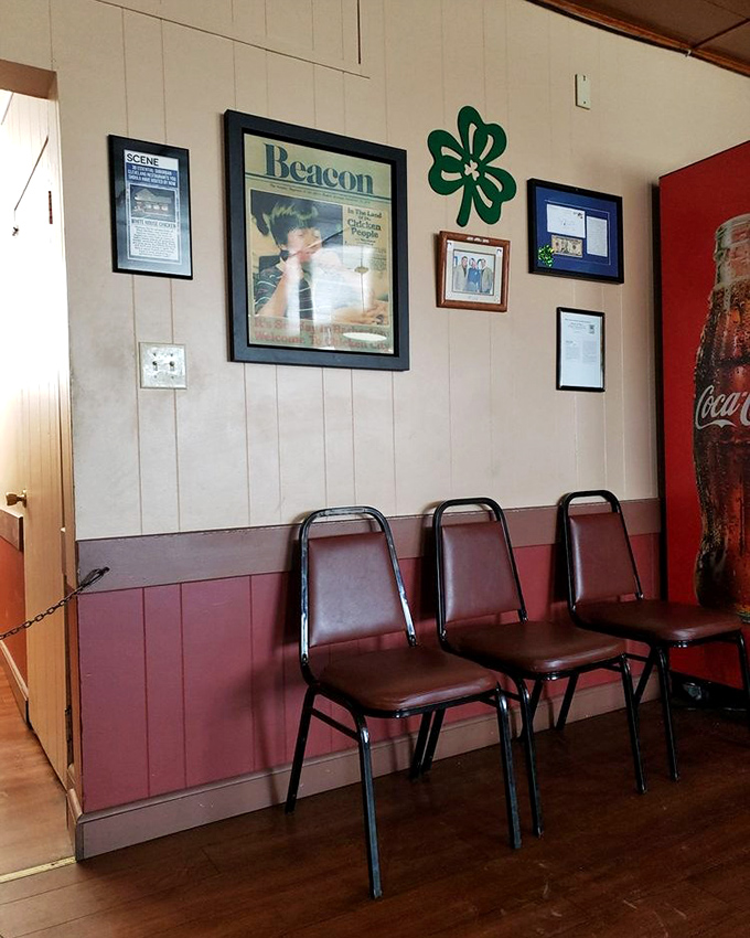 Framed newspaper clippings tell the story of decades of deliciousness, while simple decor keeps your focus where it belongs &ndash; on the legendary chicken.