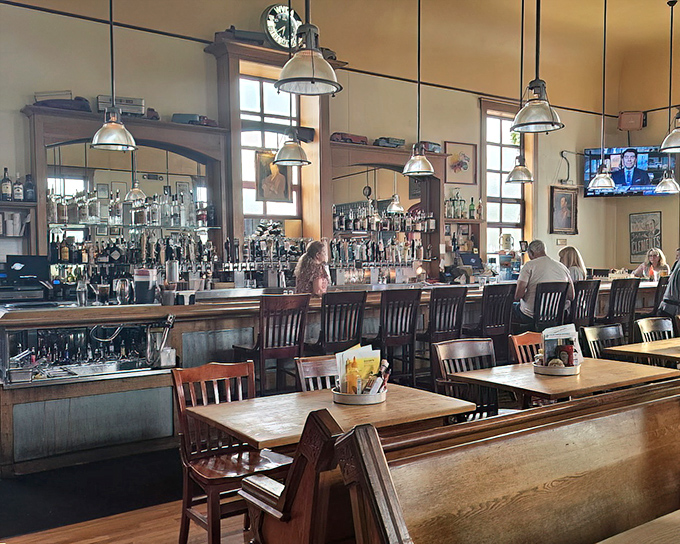 Where strangers become friends over great food. The warm wood tones and industrial lighting create the perfect backdrop for memory-making meals.