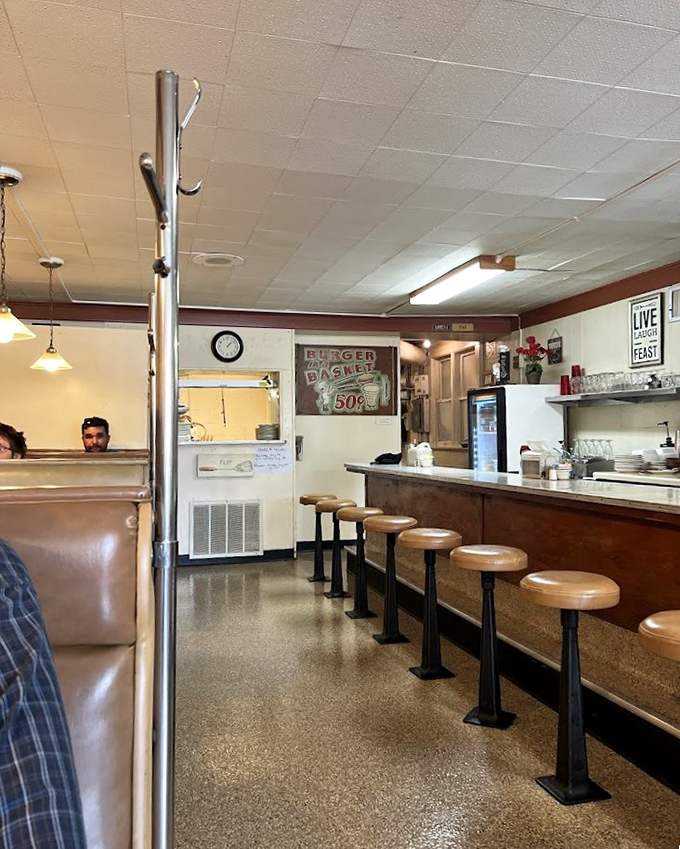 Where strangers become regulars and regulars become family. The diner counter&mdash;America's original social network, no password required.