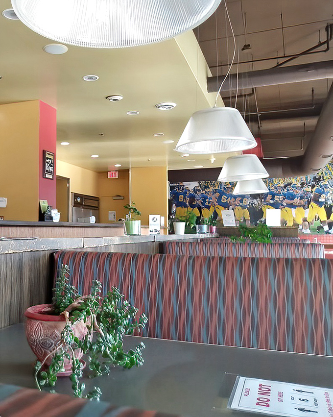 Warm yellow walls and vintage sports imagery create an atmosphere where calories don't count and diet plans go to die happily.