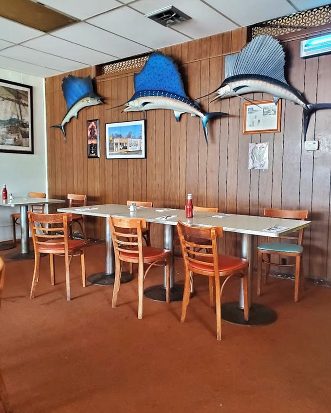 Wood paneling and blue marlins &ndash; the classic fish joint d&eacute;cor that signals authenticity before you take your first bite.