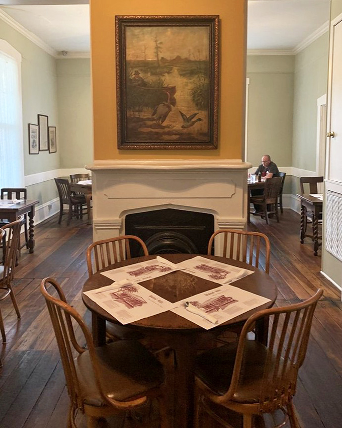 A dining room where history and hunger meet. That fireplace has likely witnessed countless declarations of "best meal I've ever had" over the decades.