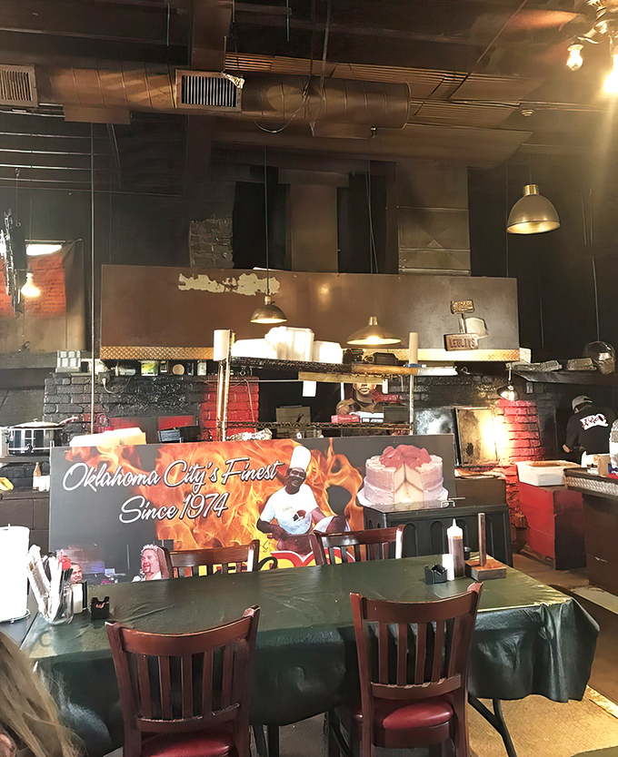 The dining room buzzes with that authentic energy only genuine barbecue establishments can generate.