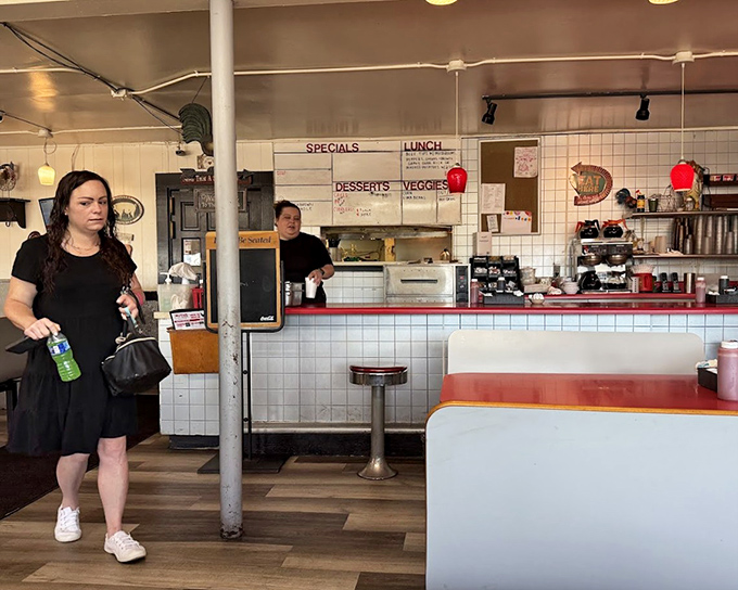 The counter and kitchen view&mdash;where the magic happens and servers move with the choreographed precision of Broadway dancers, but with better food.