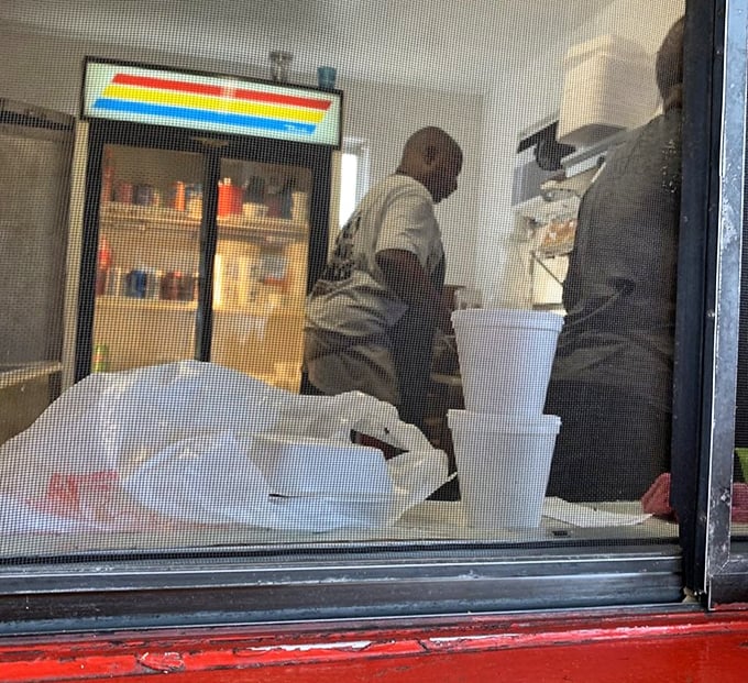 Behind the scenes where barbecue magic happens &ndash; no fancy kitchen equipment, just the essentials needed for transformation.