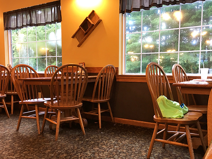 Windsor chairs and large windows create that "grandma's dining room, but bigger" atmosphere that makes everyone feel instantly at home.