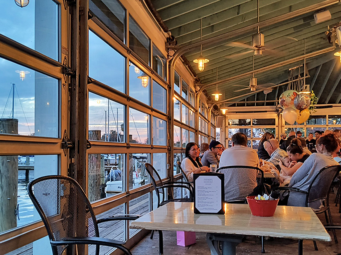 Sunset transforms the dining room into a magical space where water views compete with plate views for your attention. Both win.