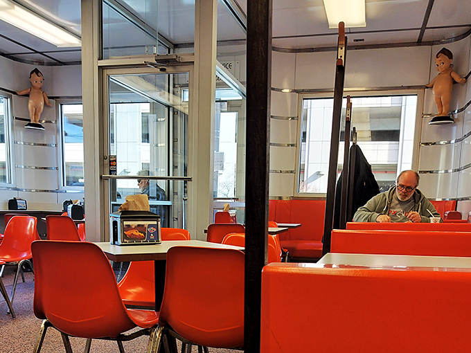 More Kewpee dolls watch over diners from their perches&mdash;silent guardians of burger tradition in a world gone mad for food fads.