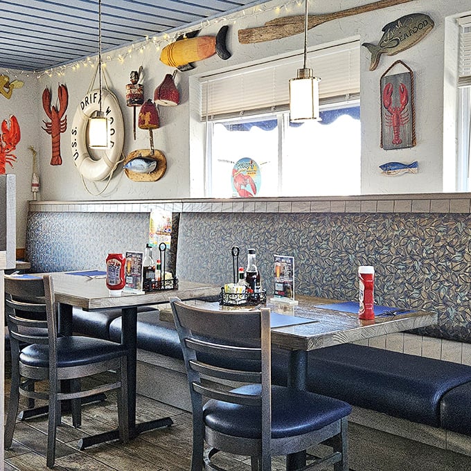 Every inch of wall space celebrates coastal culture with life preservers, fishing gear, and nautical art that transports you straight to the sea.