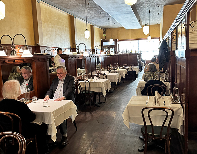 Another angle of the dining room reveals the perfect balance of elegance and comfort &ndash; fancy enough for special occasions, comfortable enough for Tuesday lunch.