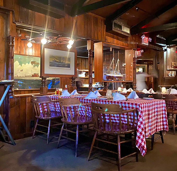 Classic red-checkered tablecloths and wooden chairs&mdash;seafood's perfect stage setting. This isn't trendy dining; it's timeless comfort where memories are made.