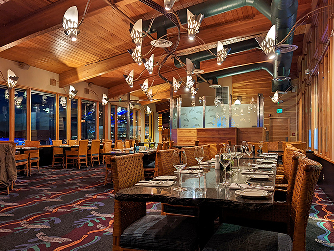 The upstairs dining room glows with artistic lighting that makes everyone look ten years younger.
