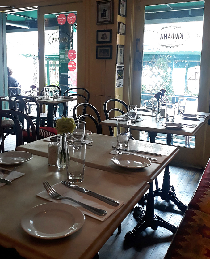 Morning light streams through windows, illuminating tables set for the day's culinary journeys &ndash; each place setting an invitation to slow down and savor.