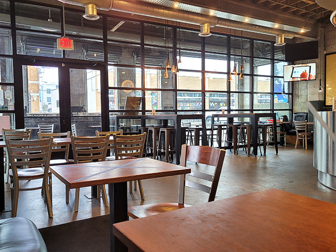 Floor-to-ceiling windows flood the industrial-cool space with natural light, making the anticipation of smoked delights even more tantalizing.