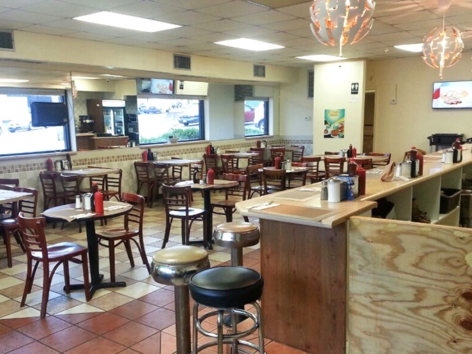 Morning light streams through the windows, illuminating a temple of breakfast where coffee flows and home fries reign supreme.