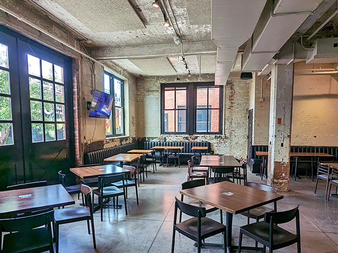 Industrial meets inviting &ndash; the kind of space where exposed beams and minimalist furniture somehow feel more comfortable than your living room.