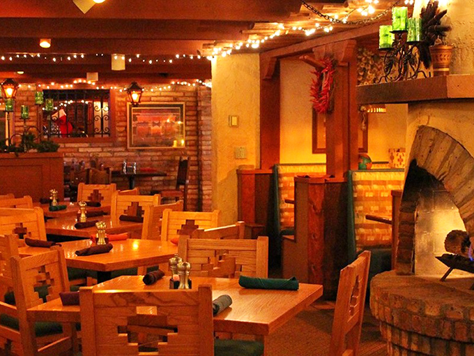 Warm lighting, wooden tables, and brick walls create that magical atmosphere where conversations flow as smoothly as the wine.